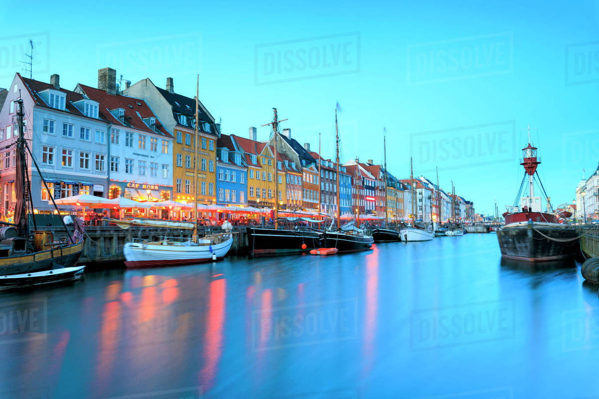 Night view of the illuminated harbour and canal of the entertainment ...
