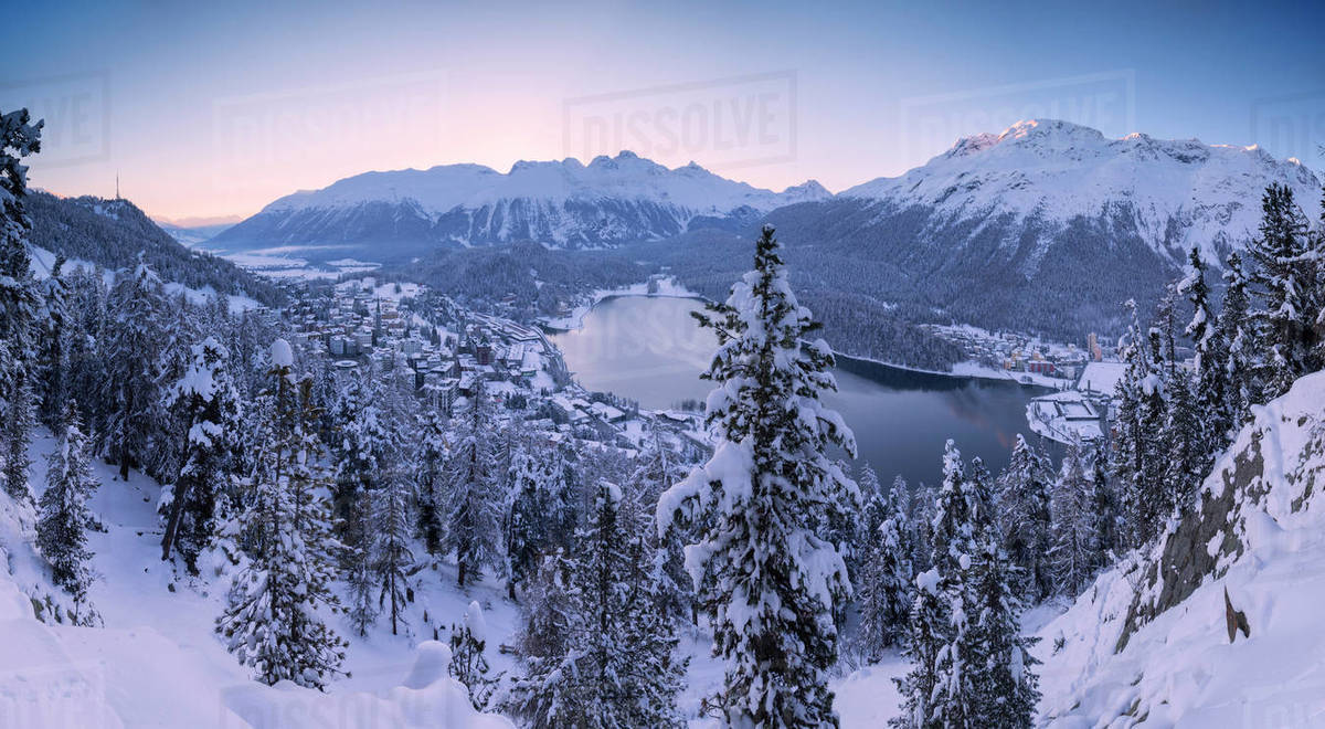 Panoramic of village and Lake of St. Moritz covered with snow, Engadine ...