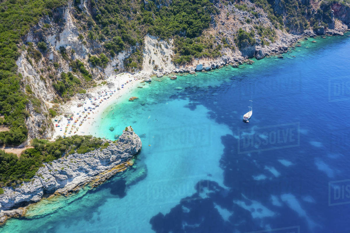 Aerial drone photo of iconic paradise sandy beach of Agiofili near port ...