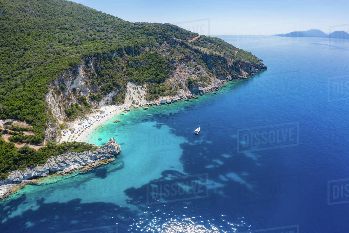 Aerial drone photo of iconic paradise sandy beach of Agiofili near port ...