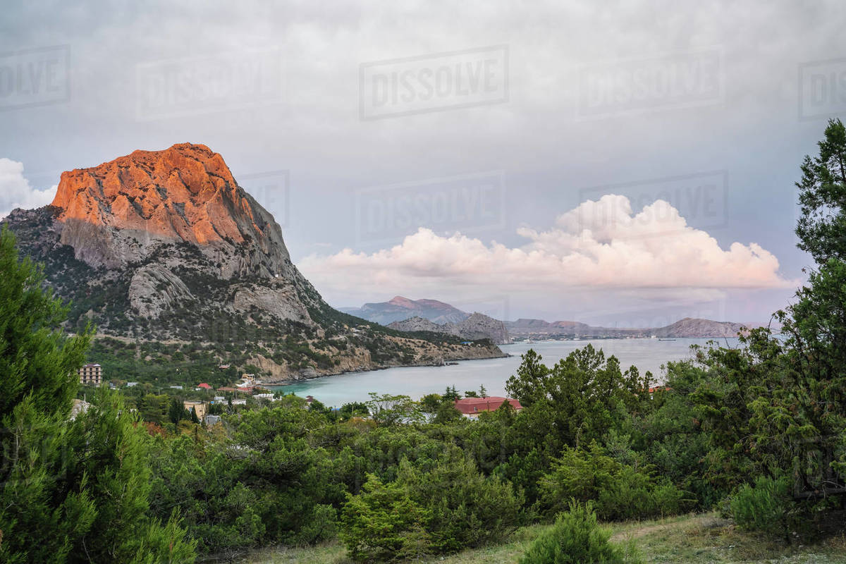 Aerial panoramic view of mount Falcon lit by pink sunset in Novyi Svit ...