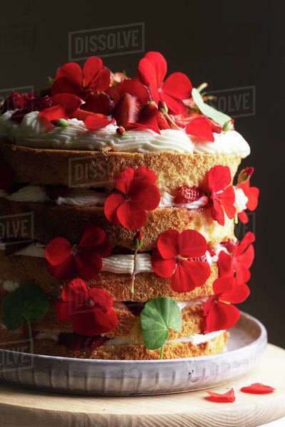 Beautiful biscuit cake with strawberries decorated with natural ...