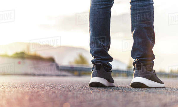 Close up hitchhiker legs on highway, journey concept. - Stock Photo ...