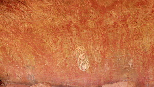 YULARA, AUSTRALIA - rock art in the boy's teaching cave of uluru at ...