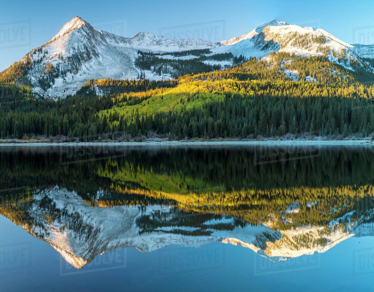 Colorado, East Beckwith Mountain. Composite of reflection in Lost Lake ...