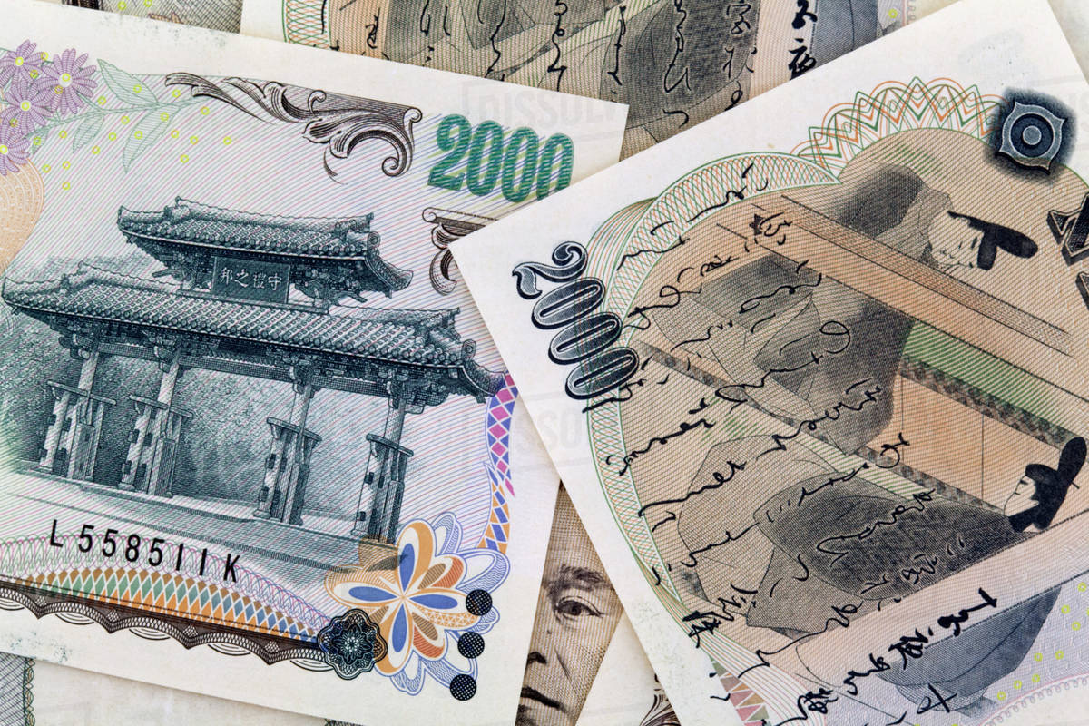 Japan. Detail of Japanese paper currency, the Yen. - Stock Photo - Dissolve
