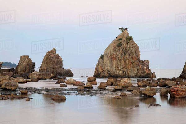 Japan, Kushimoto. Scenic of Hashiguiiwa Rocks. - Stock Photo - Dissolve
