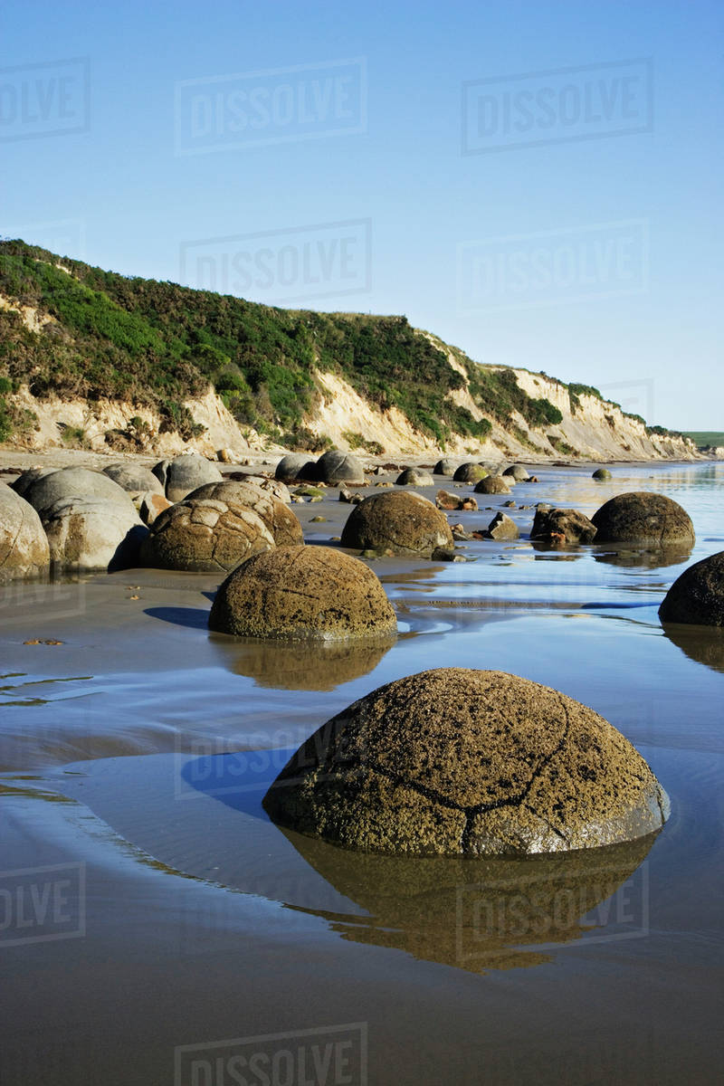 South Pacific, New Zealand, South Island. View of round rocks at ...