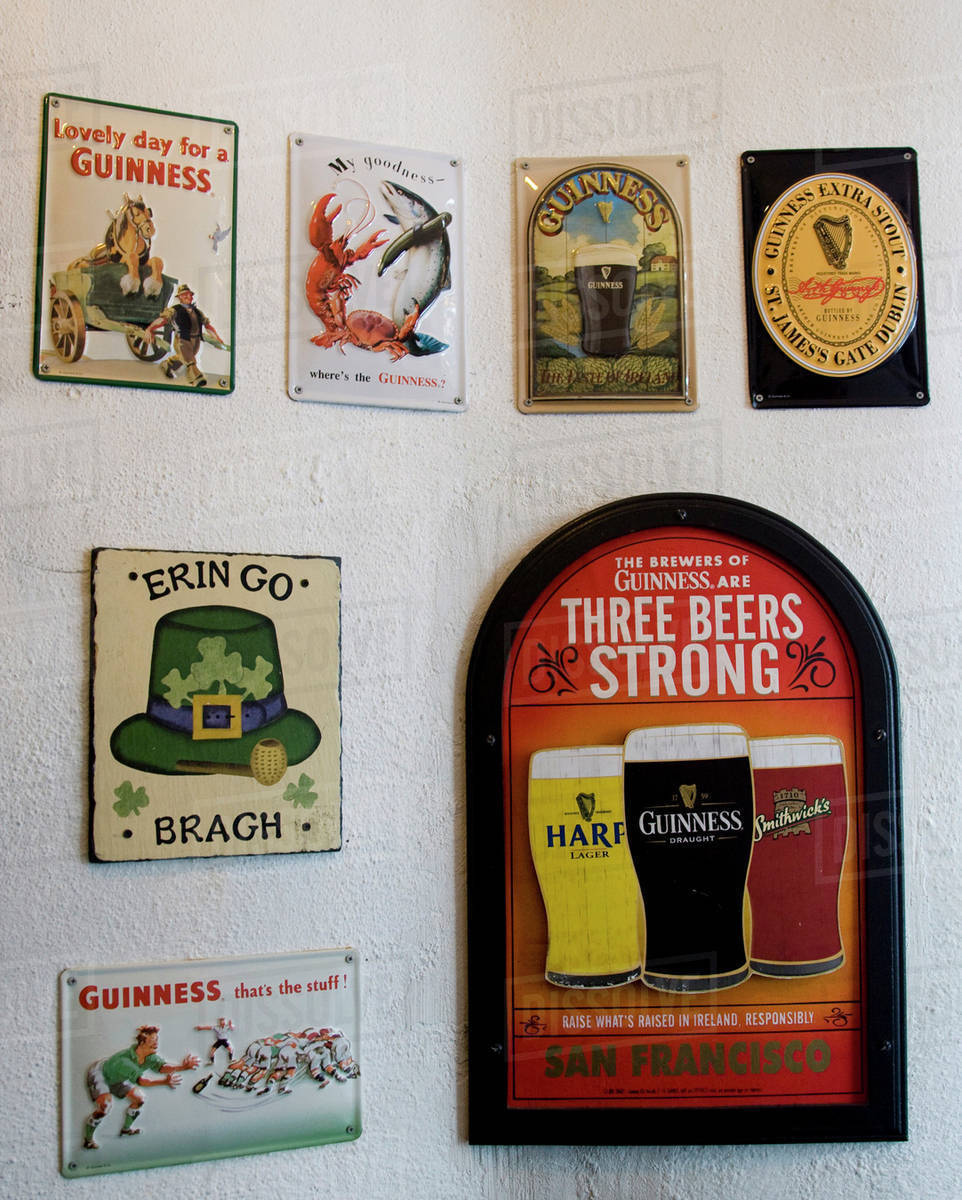 USA, California, San Francisco. Irish beer signs. - Stock Photo - Dissolve