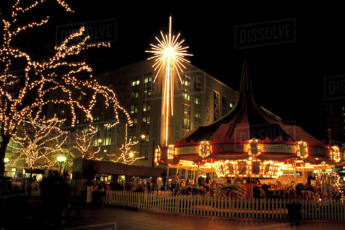 USA, Washington State, Seattle, Westlake Center at night during holiday ...