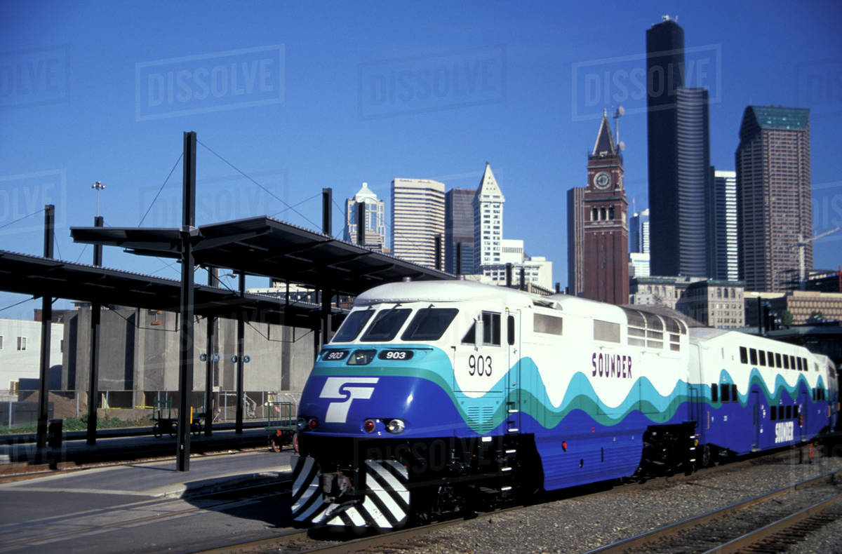 USA, Washington, Seattle. Sounder Commuter Train leaves King Street ...