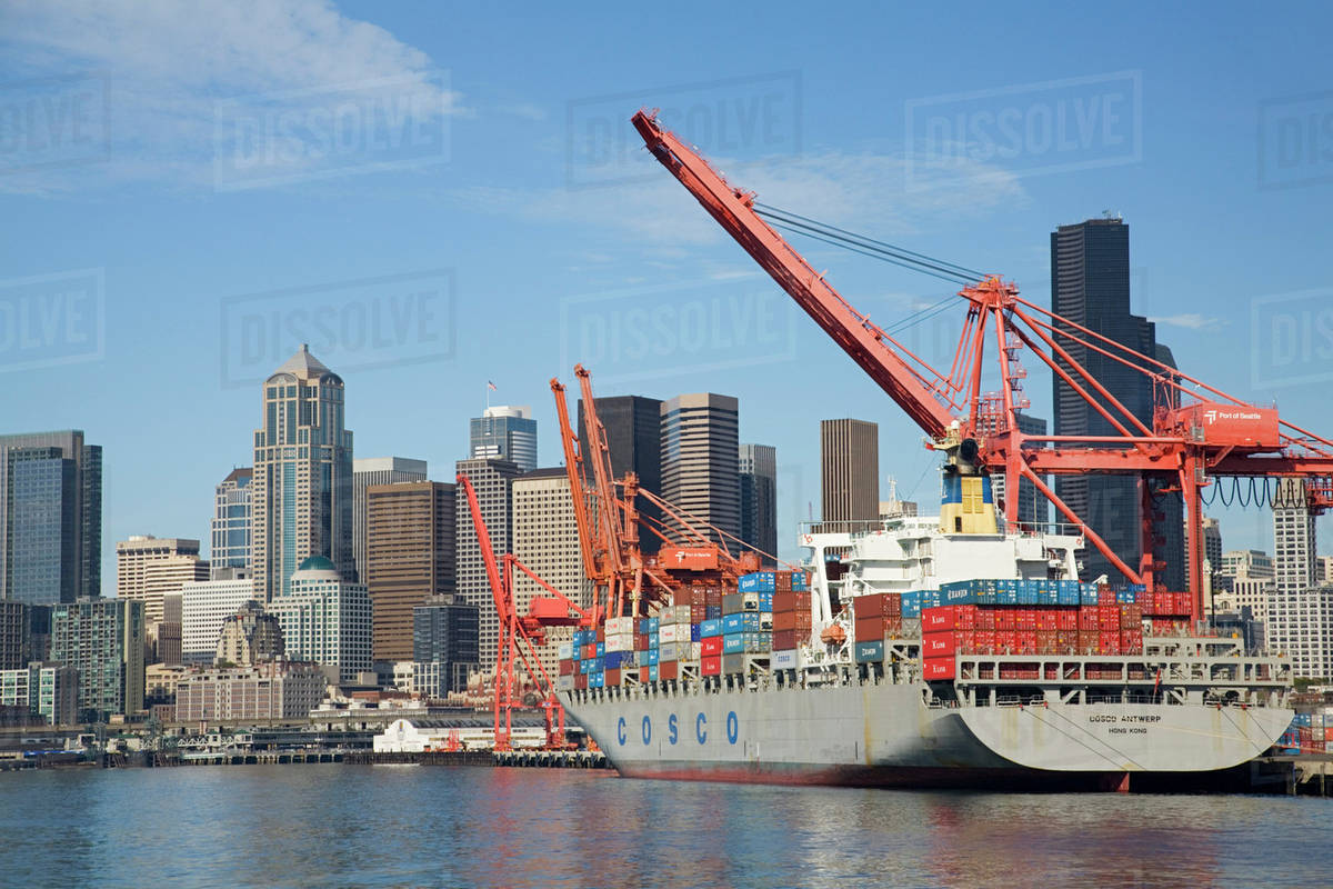 WA, Seattle, Seattle skyline with cargo ship from Elliott Bay - Royalty ...