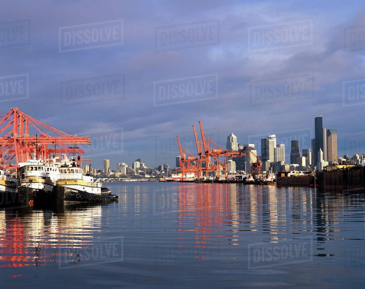 WA, Seattle, Tug boats and container ships at the Port of Seattle on ...