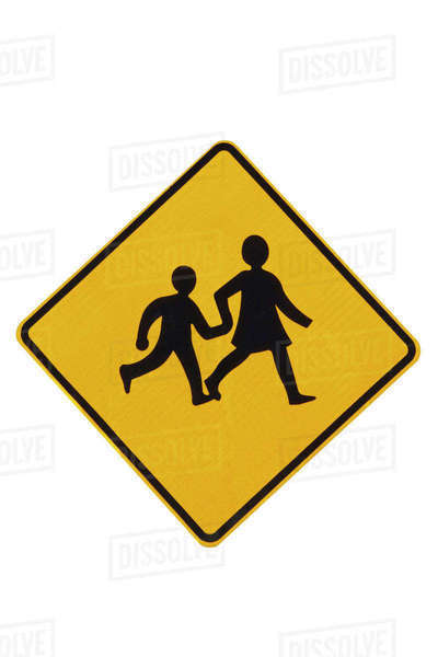 Children crossing warning sign, New Zealand - Stock Photo - Dissolve