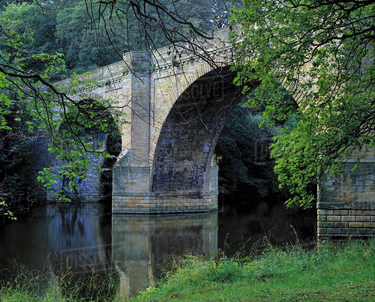 Europe, England, Durham. The graceful arches of this stone bridge span ...