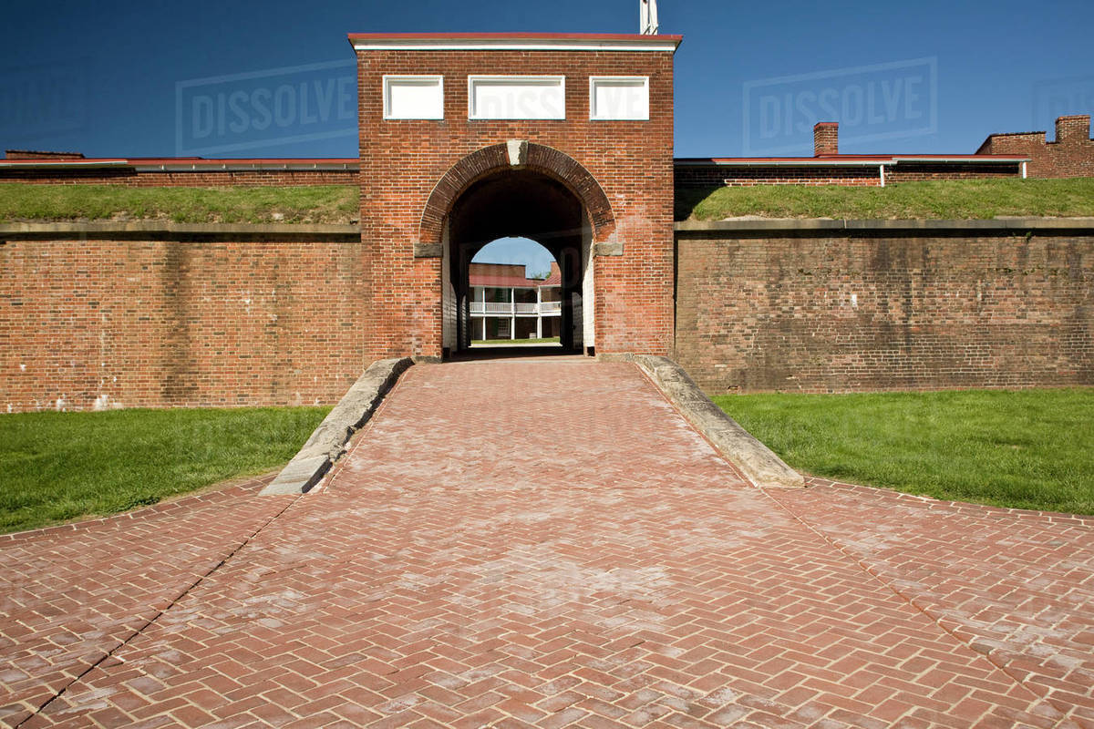 USA, MD, Baltimore. The arched entrance into the fortified walls of ...