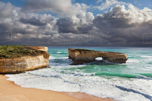 London Arch at the Great Ocean Road, Australia, during storm and ...