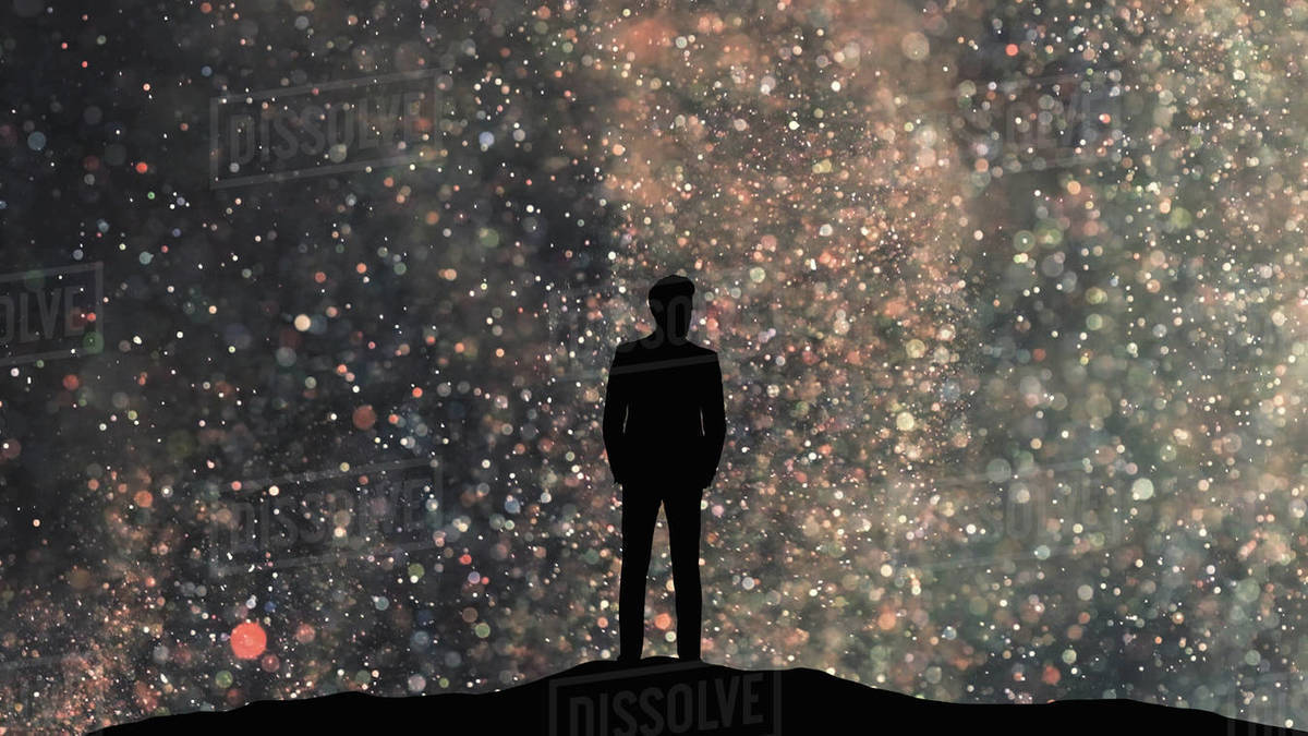 The human silhouette standing on a starry sky background - Stock Photo ...