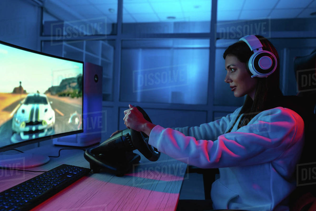 The gamer girl playing video games - Royalty-free Stock Photo | Dissolve