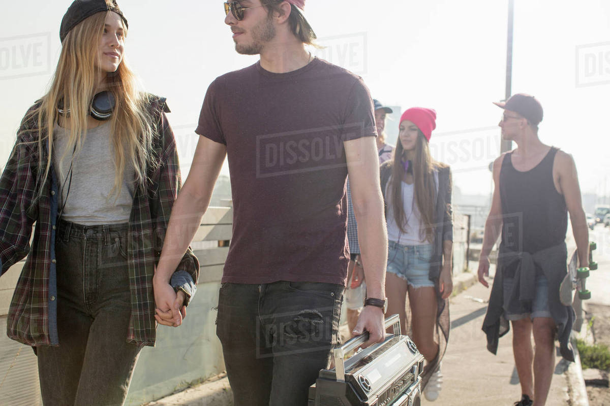 Skateboarders walking on street, Budapest, Hungary - Royalty-free Stock Photo | Dissolve