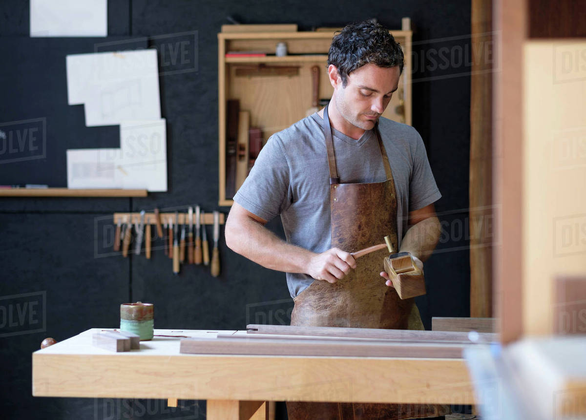 Carpenter at his workshop - Royalty-free Stock Photo | Dissolve