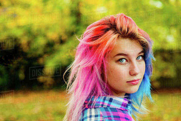 Portrait of teenage girl with multi-coloured hair, outdoors - Royalty ...