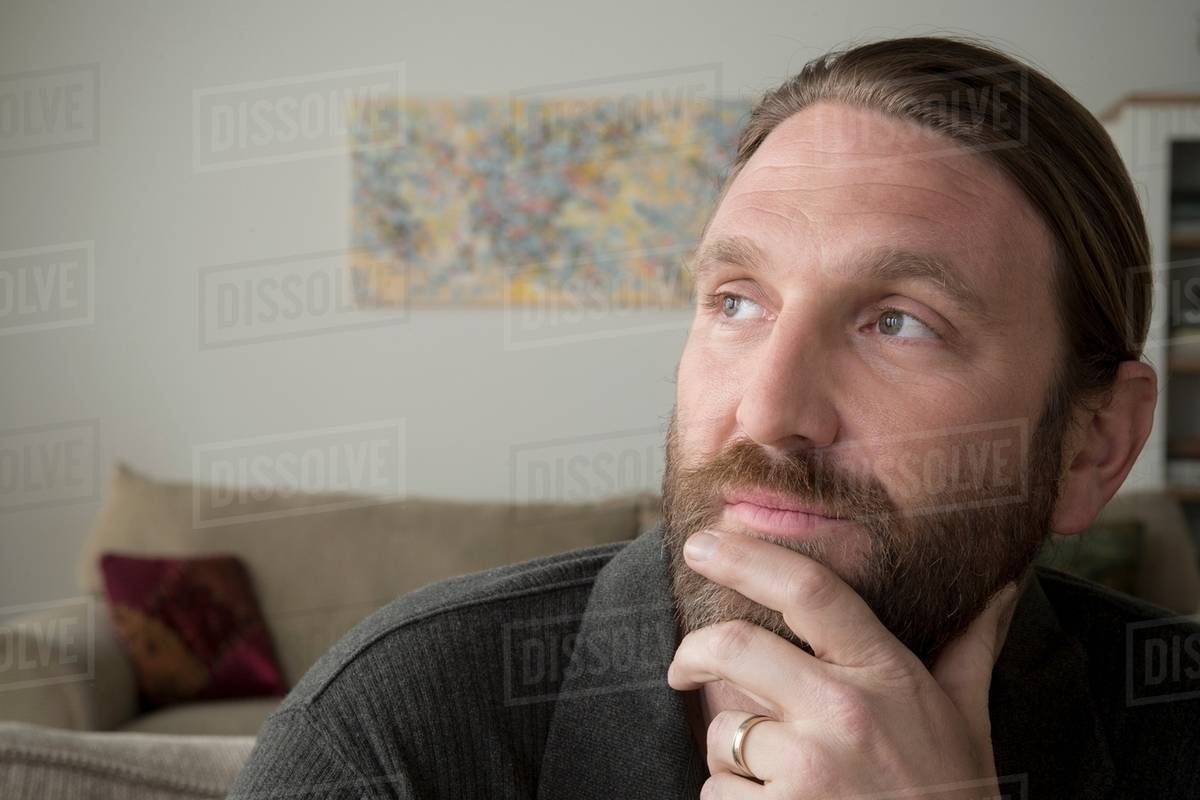 Man day dreaming - Stock Photo - Dissolve