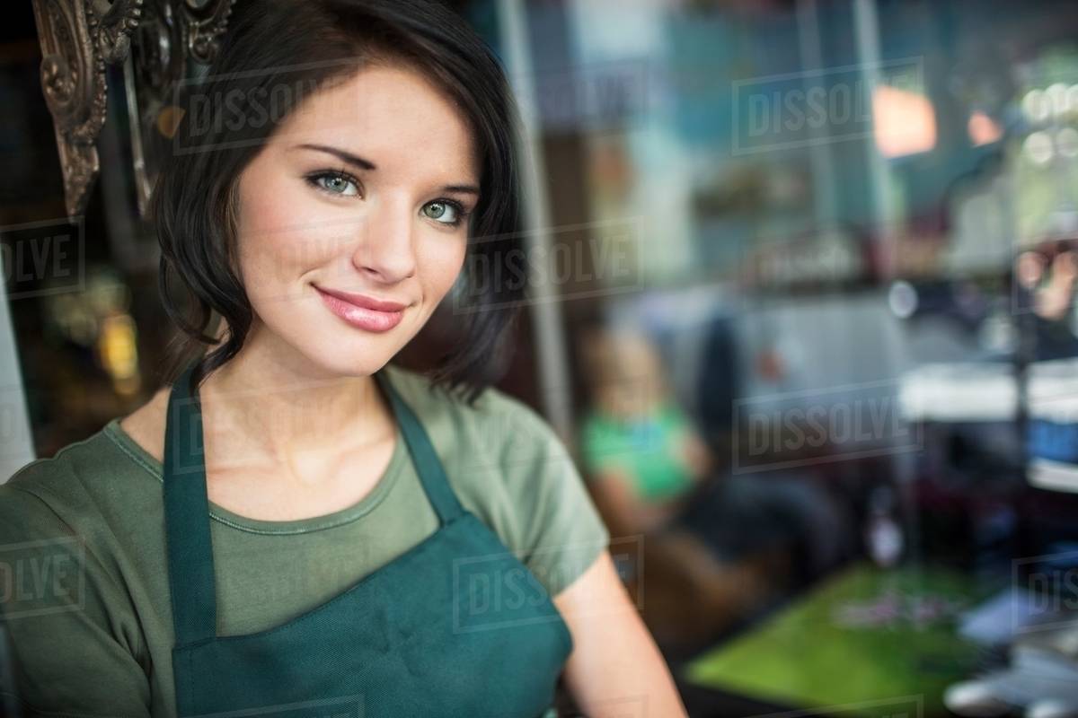 Portrait of teenage girl in cafe - Royalty-free Stock Photo | Dissolve