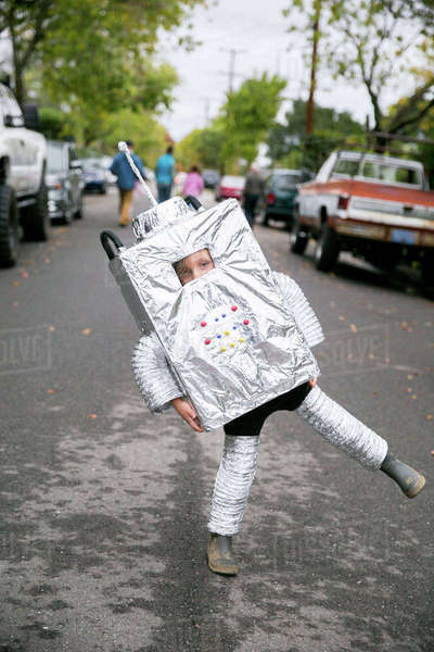 Portrait of boy in robot costume on street - Royalty-free Stock Photo ...
