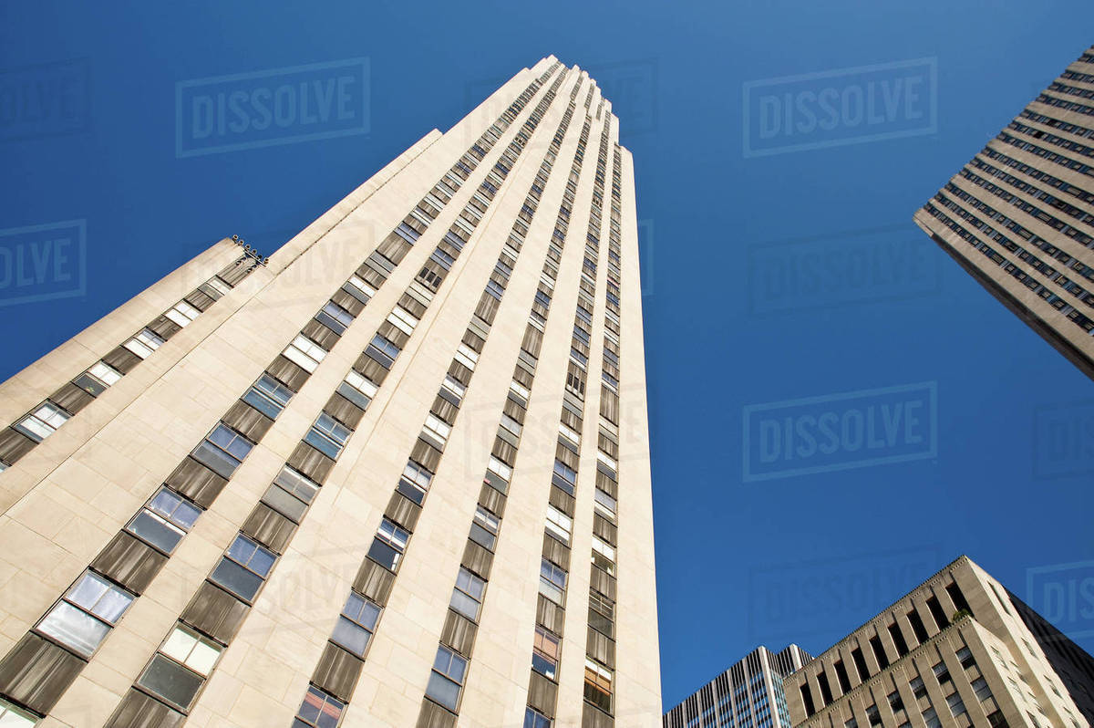 Low angle view of urban skyscraper - Royalty-free Stock Photo | Dissolve