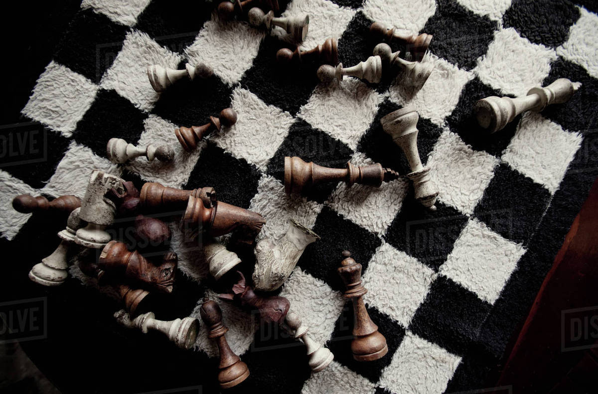 Game pieces on furry chess board - Royalty-free Stock Photo | Dissolve