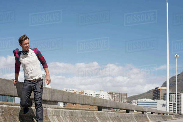Man walking on city street - Stock Photo - Dissolve