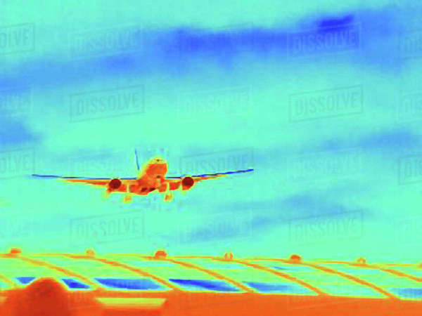 Thermal image of airplane in sky - Royalty-free Stock Photo | Dissolve