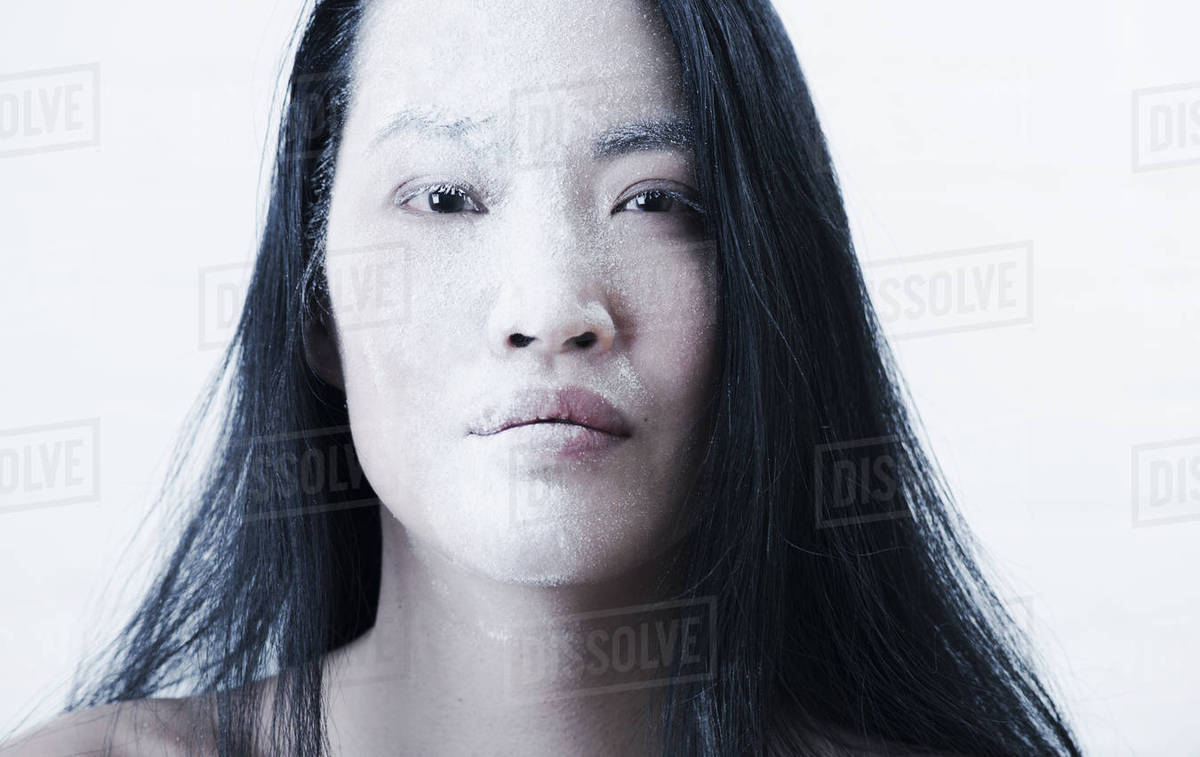 Woman's face covered in powder - Royalty-free Stock Photo | Dissolve