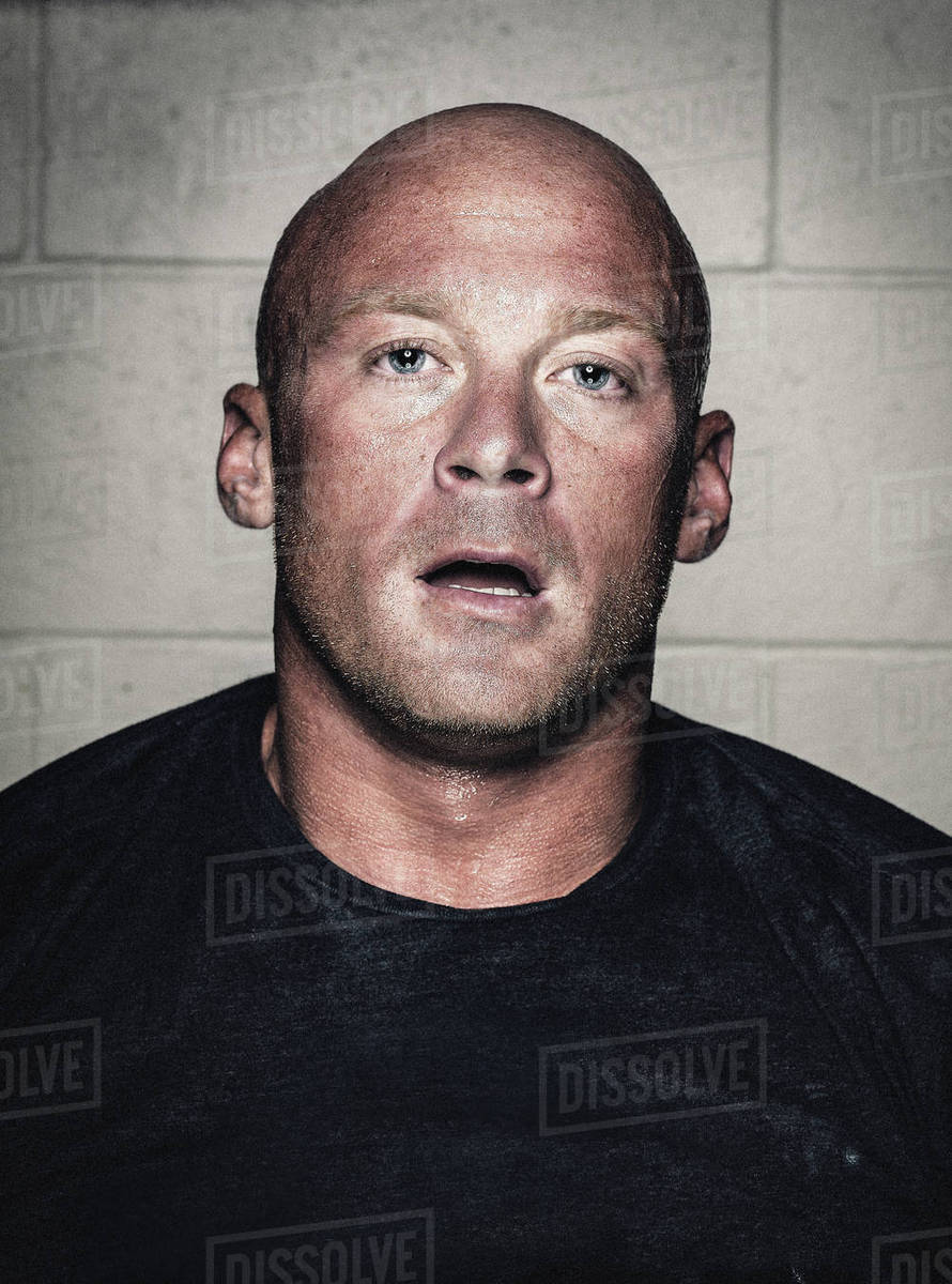 Portrait of bald young man with open mouth after workout - Royalty-free ...