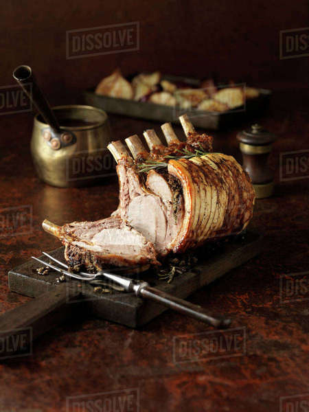 Carved rack of pork - Royalty-free Stock Photo | Dissolve