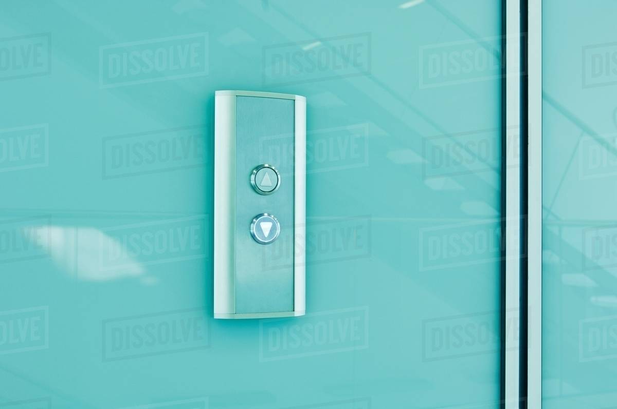 Elevator controls in modern office block - Stock Photo - Dissolve