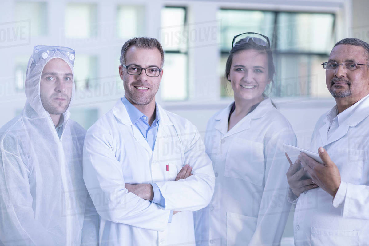 Portrait of four laboratory workers in lab - Royalty-free Stock Photo ...