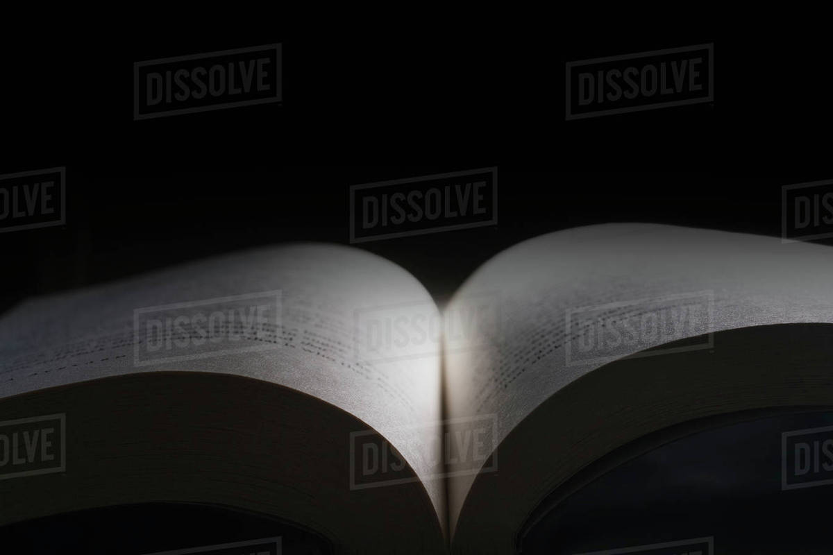 Open book, black background - Royalty-free Stock Photo | Dissolve