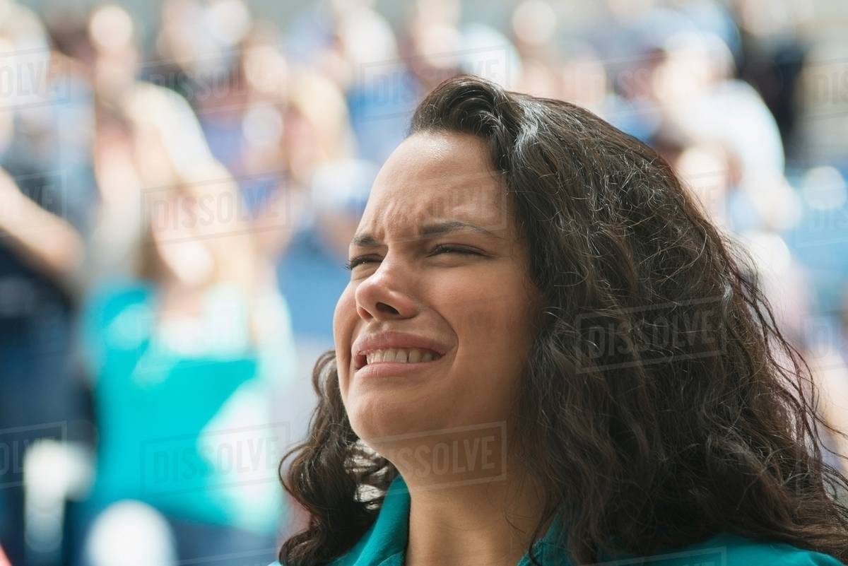 Female spectator looking upset - Royalty-free Stock Photo | Dissolve