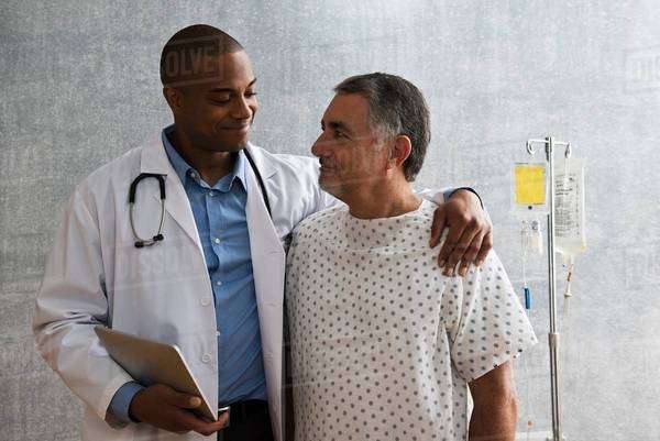 Doctor supporting patient - Royalty-free Stock Photo | Dissolve