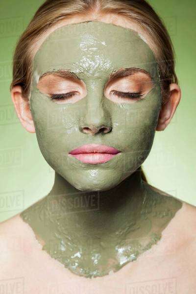 Woman with face mask - Stock Photo - Dissolve