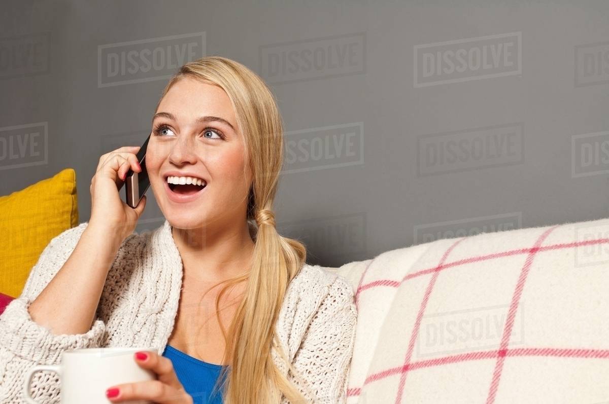 Woman on cell phone - Royalty-free Stock Photo | Dissolve