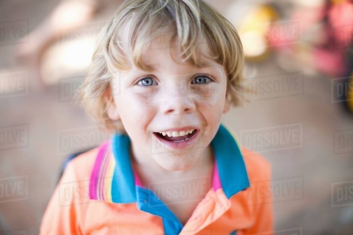 Close up of boy's smiling face - Royalty-free Stock Photo | Dissolve