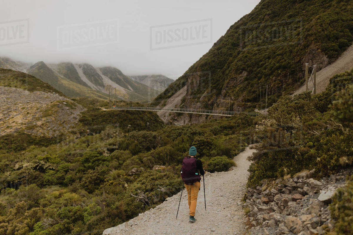 Hiker exploring trail, Wanaka, Taranaki, New Zealand - Royalty-free ...