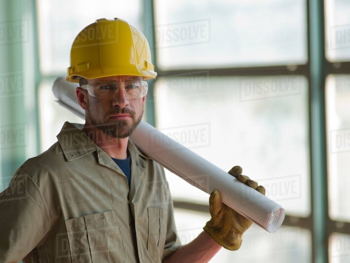 Engineer wearing hard hat on site - Royalty-free Stock Photo | Dissolve