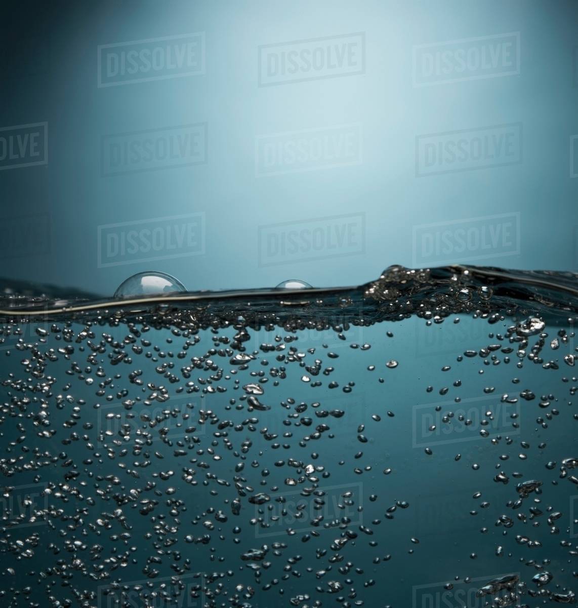 Bubbles floating in water - Stock Photo - Dissolve