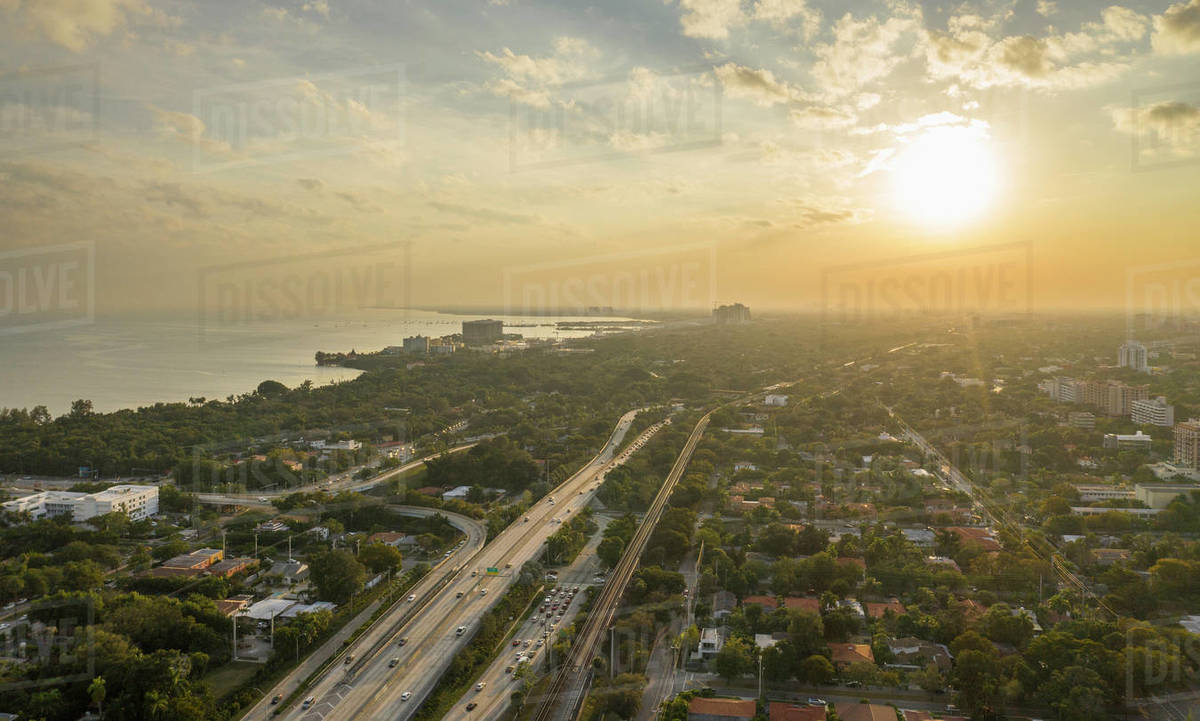 Coastline and highway at sunset, aerial view, Miami, Florida, United ...