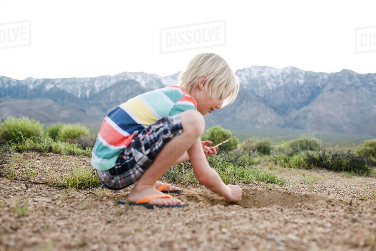 Boy exploring rural landscape, Olancha, California, US - Royalty-free ...
