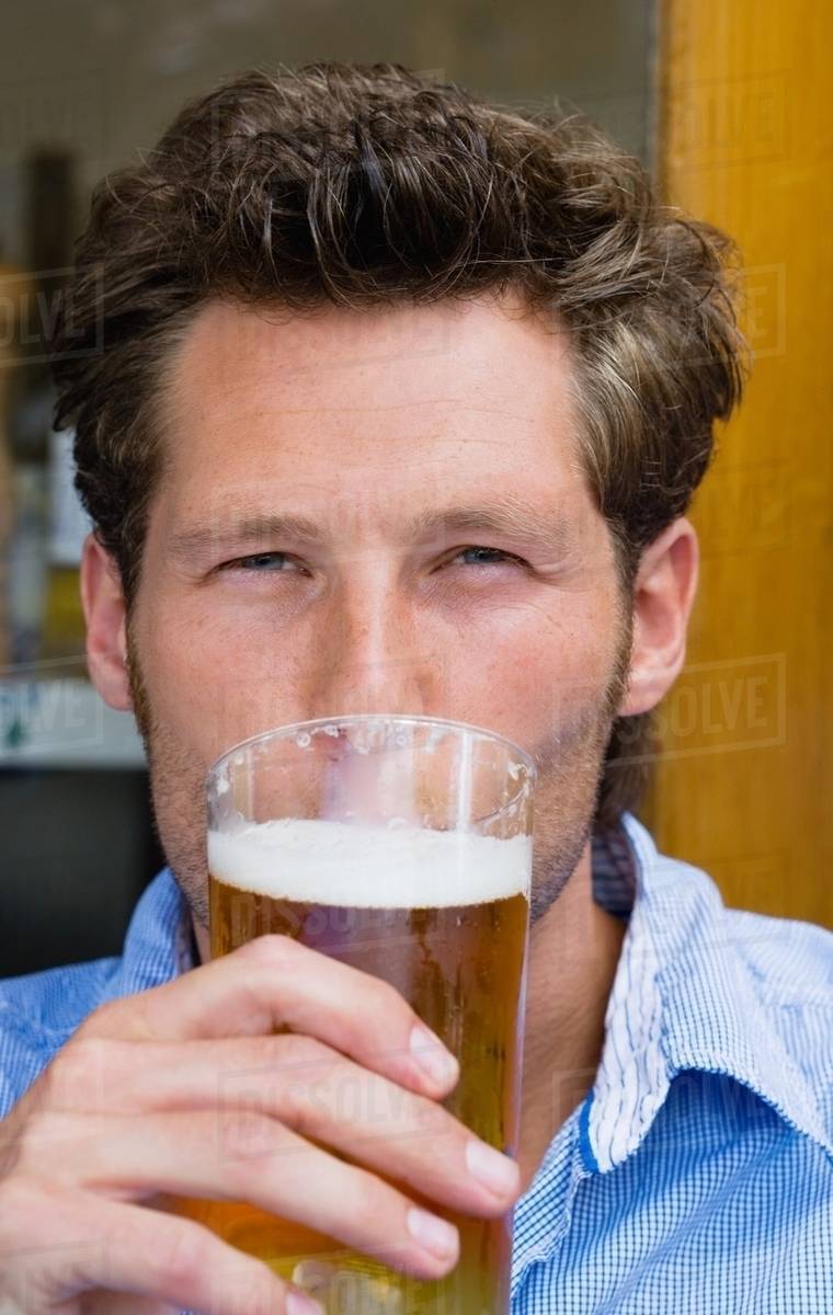 Man drinking beer - Royalty-free Stock Photo | Dissolve